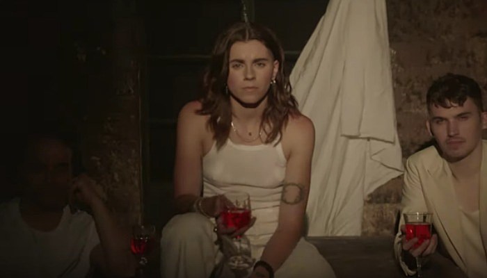 PVRIS snake their way through a cult in “Death Of Me” video