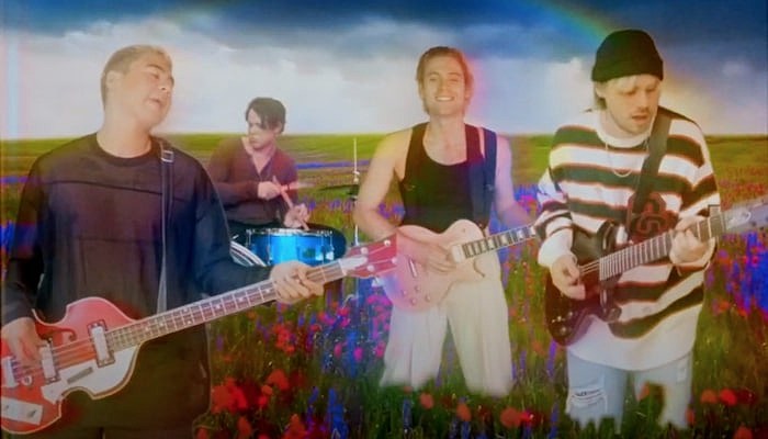 Join 5 Seconds of Summer's psychedelic paradise in the "Wildflower" video